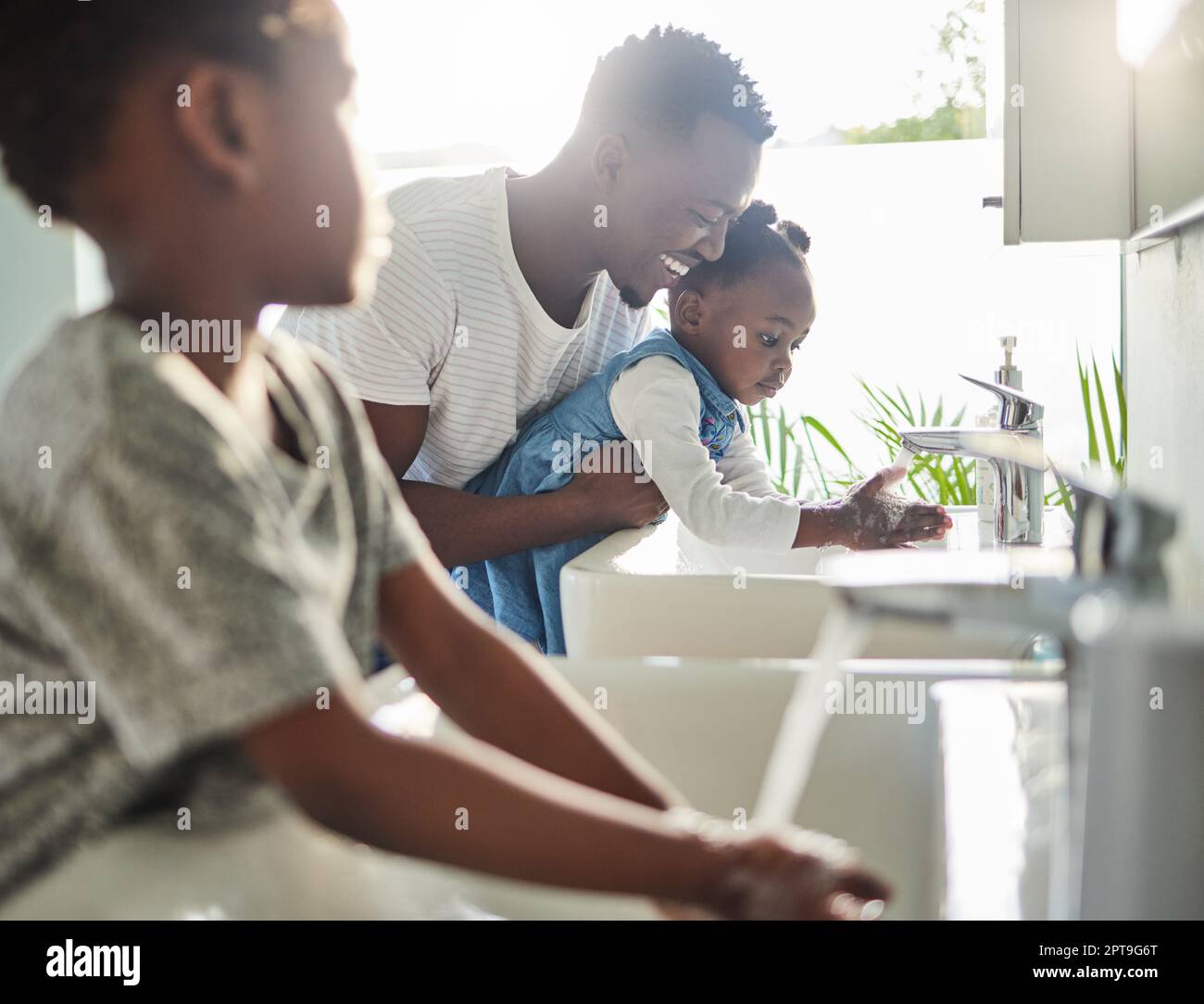 Children wash hi-res stock photography and images - Alamy