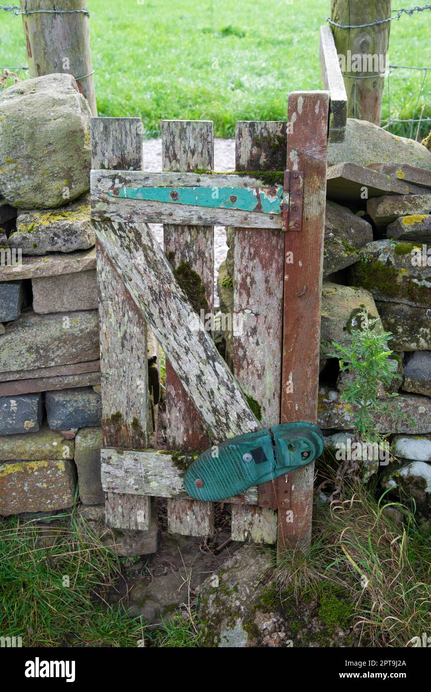 Wooden gate with a special "hinge" on a hiking path in the Yorkshire ...