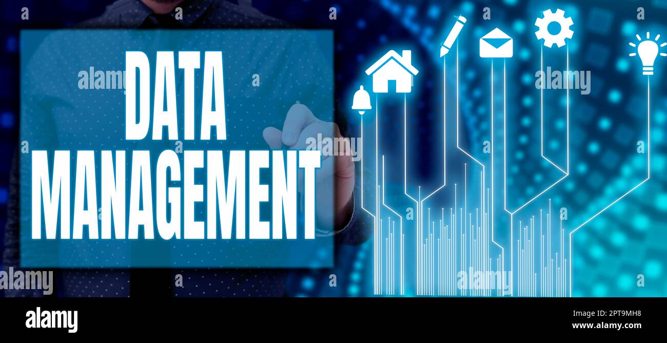Hand writing sign Data ManagementThe practice of organizing and ...