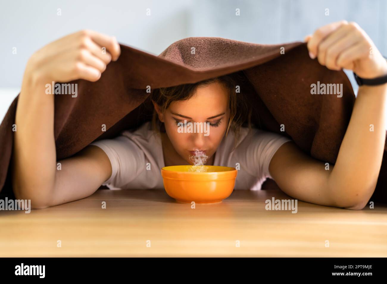 Woman Doing Inhalation Alternative Herbal Medicine Using Steam Bowl ...