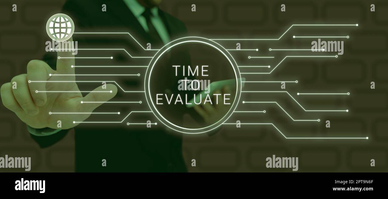 Sign displaying Time To Evaluate, Word Written on business review ...