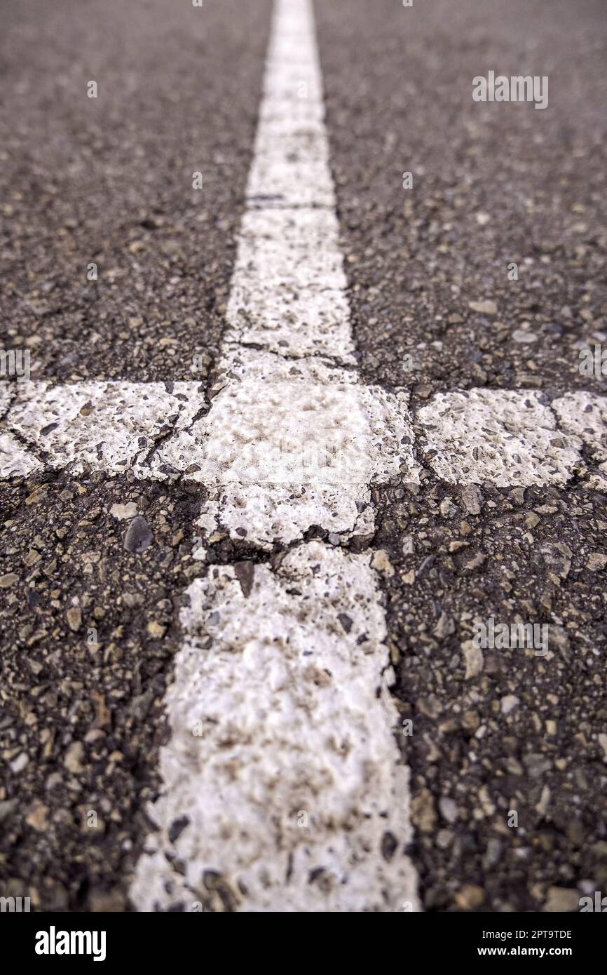Marking lines on the asphalt, information sign Stock Photo - Alamy