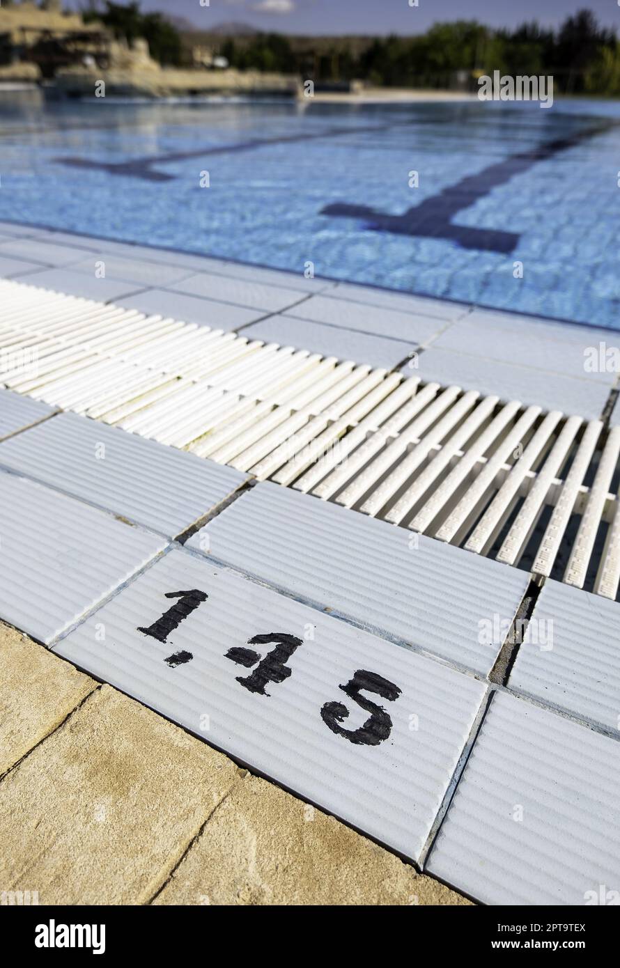 Swimming pool depth numbers hi-res stock photography and images - Alamy