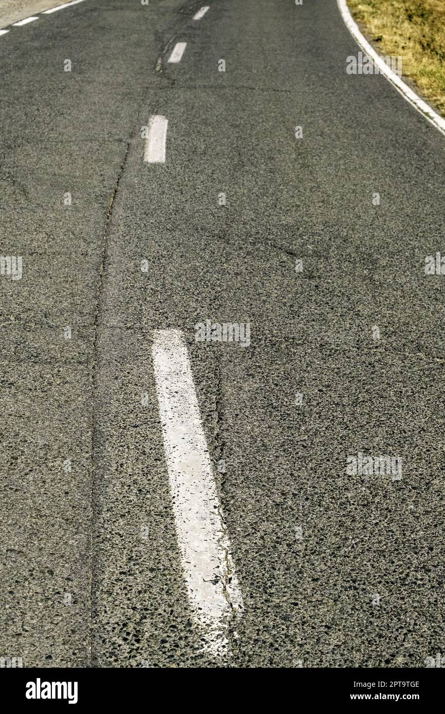 Detail of lines on a road, road safety Stock Photo - Alamy