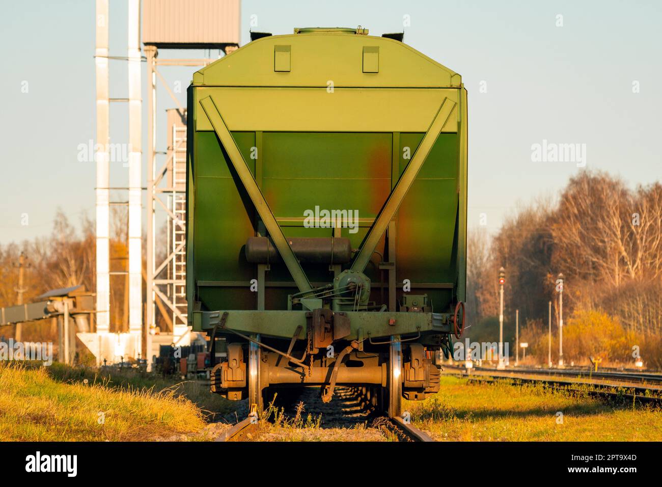 Last wagon of railway bulk carriages in a grain terminal. Railway ...