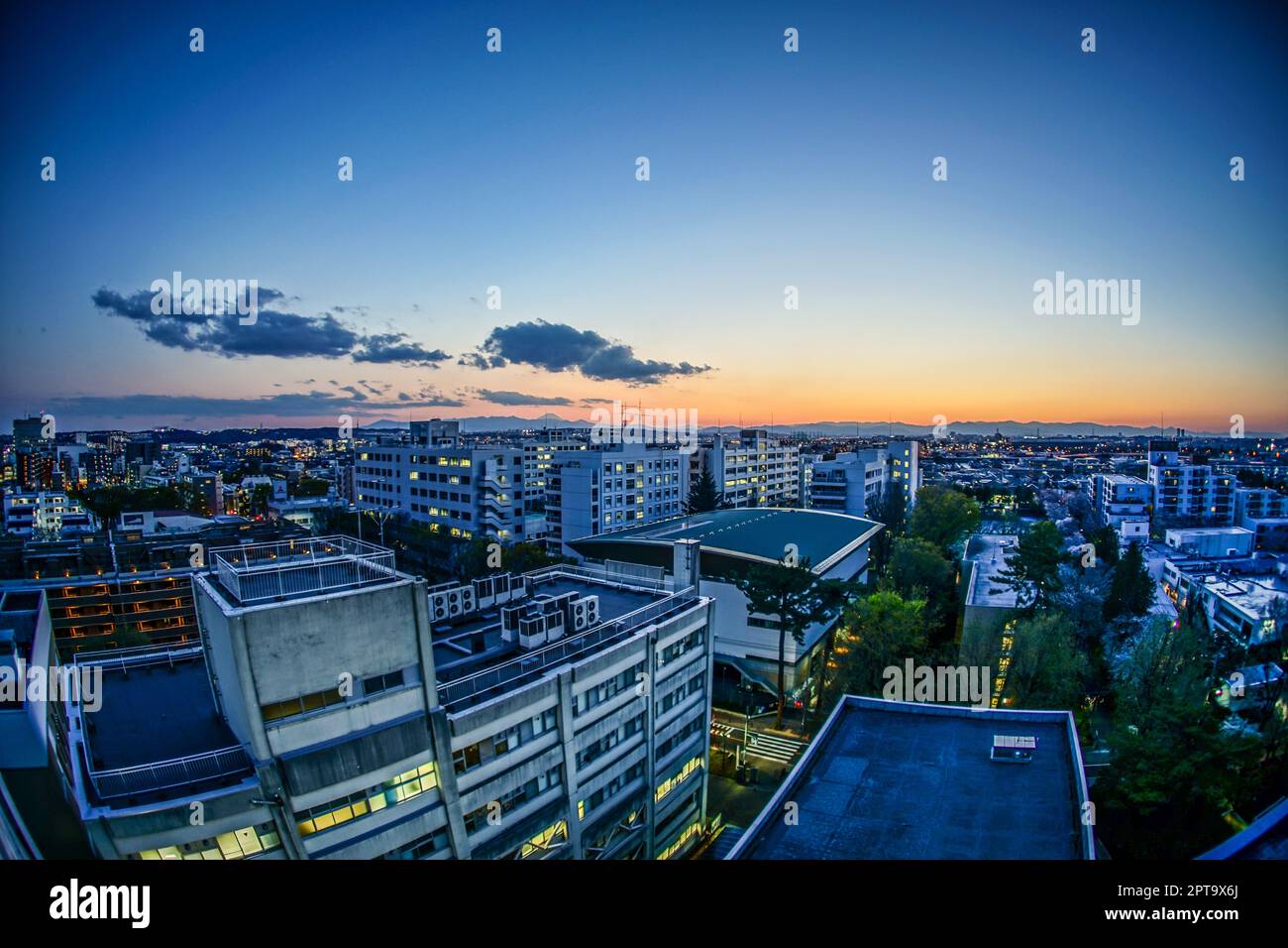Rooftops of Chofu City, which is wrapped in a sunset. Shooting Location ...