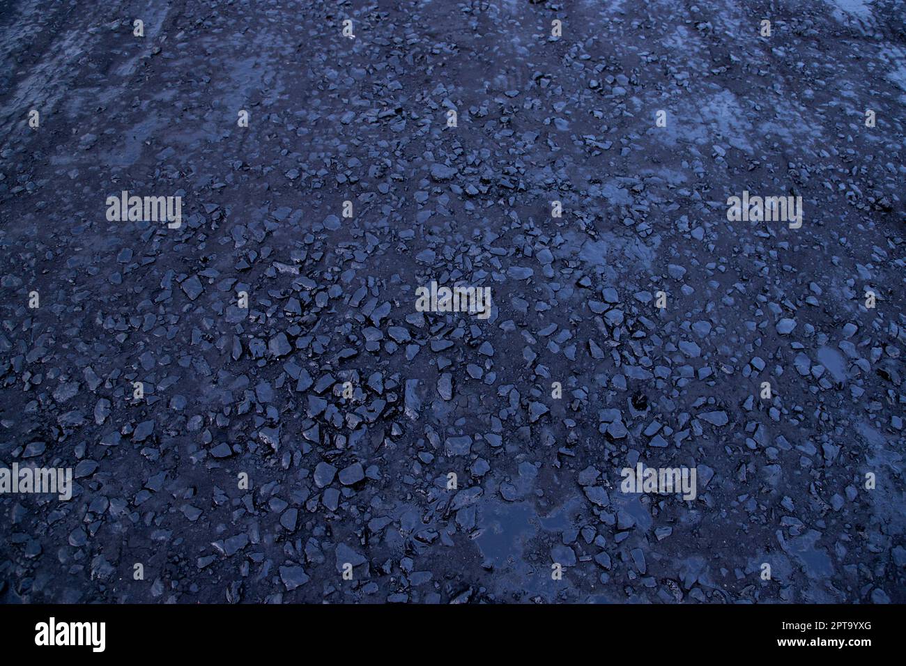 Black Raw bitumen mosaic road stone Texture background Stock Photo - Alamy