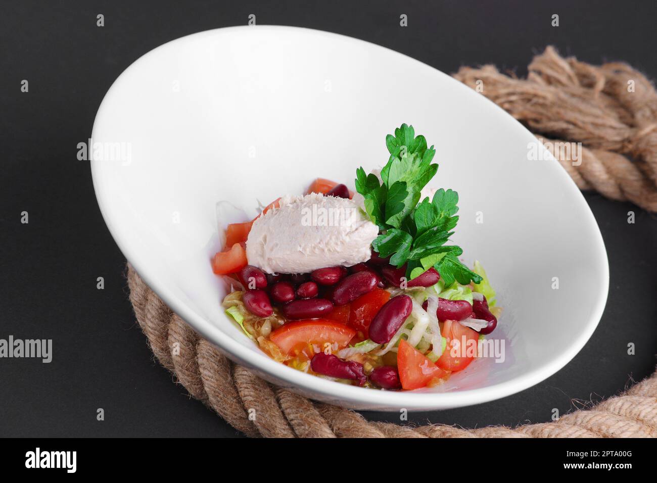 Salad with haricot bean, tomato and chicken pate Stock Photo - Alamy