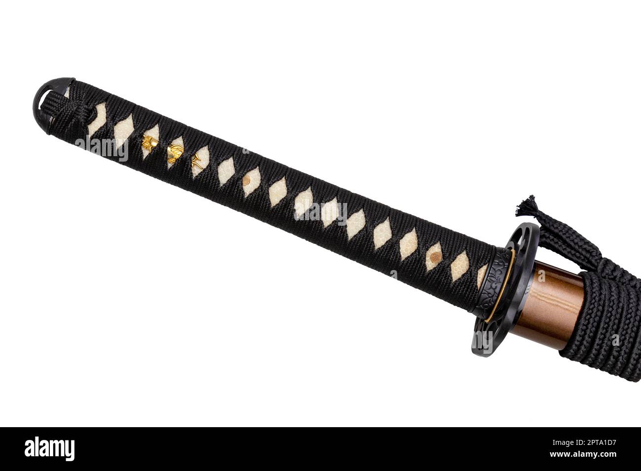 Tsuka - handle of Japanese sword wrapped by black silk cord on white ...