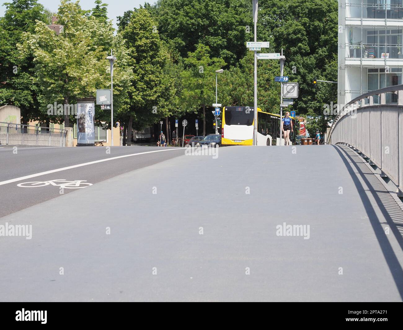 REGENSBURG, GERMANY - CIRCA JUNE 2022: People crossing Eiserne bridge ...