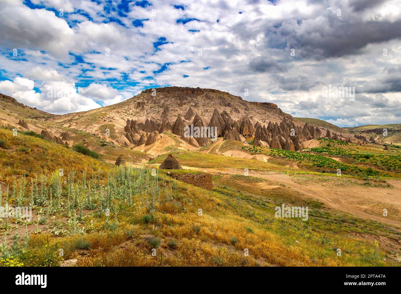 buildings carved into the rock in yaprakhisar in turkey Stock Photo - Alamy
