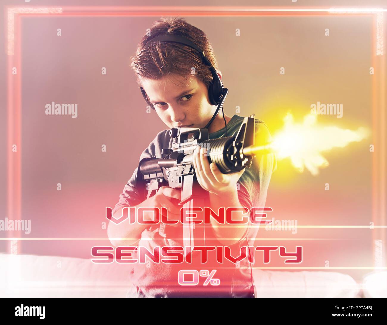Ready, aim, fire. a young boy playing violent video games Stock Photo - Alamy