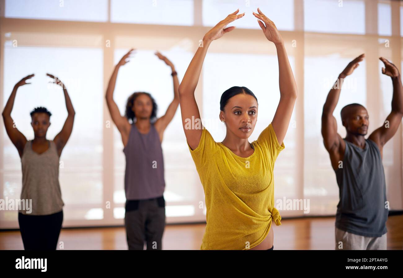 Friends and dance partners. a group of people practicing in a dance ...