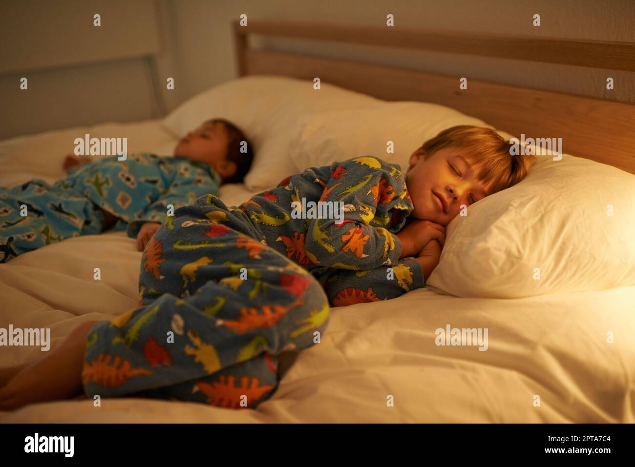 Two boys sleeping bed hi-res stock photography and images - Alamy