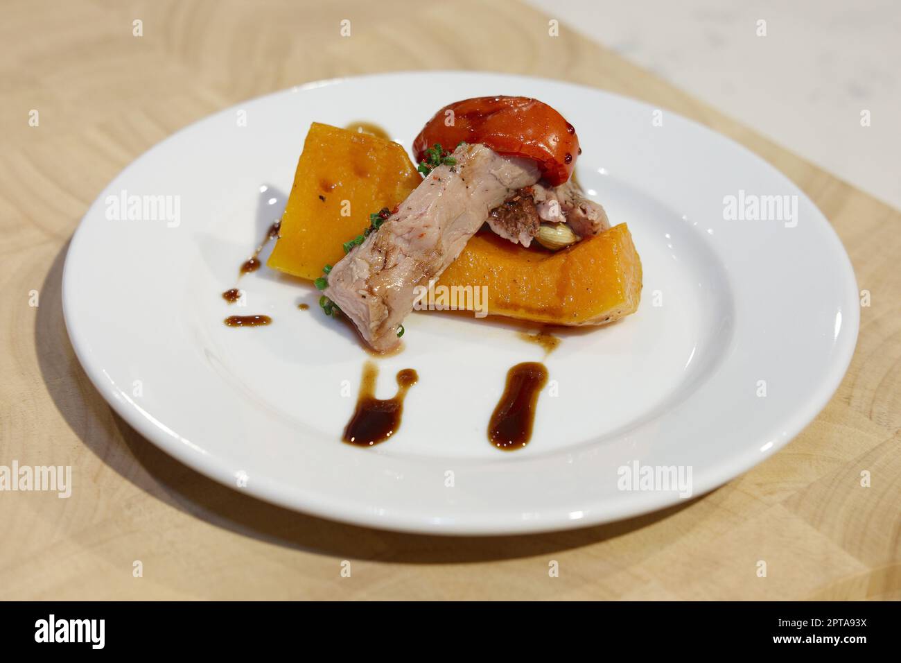 stewed veal with garlic, batat and tomato Stock Photo - Alamy
