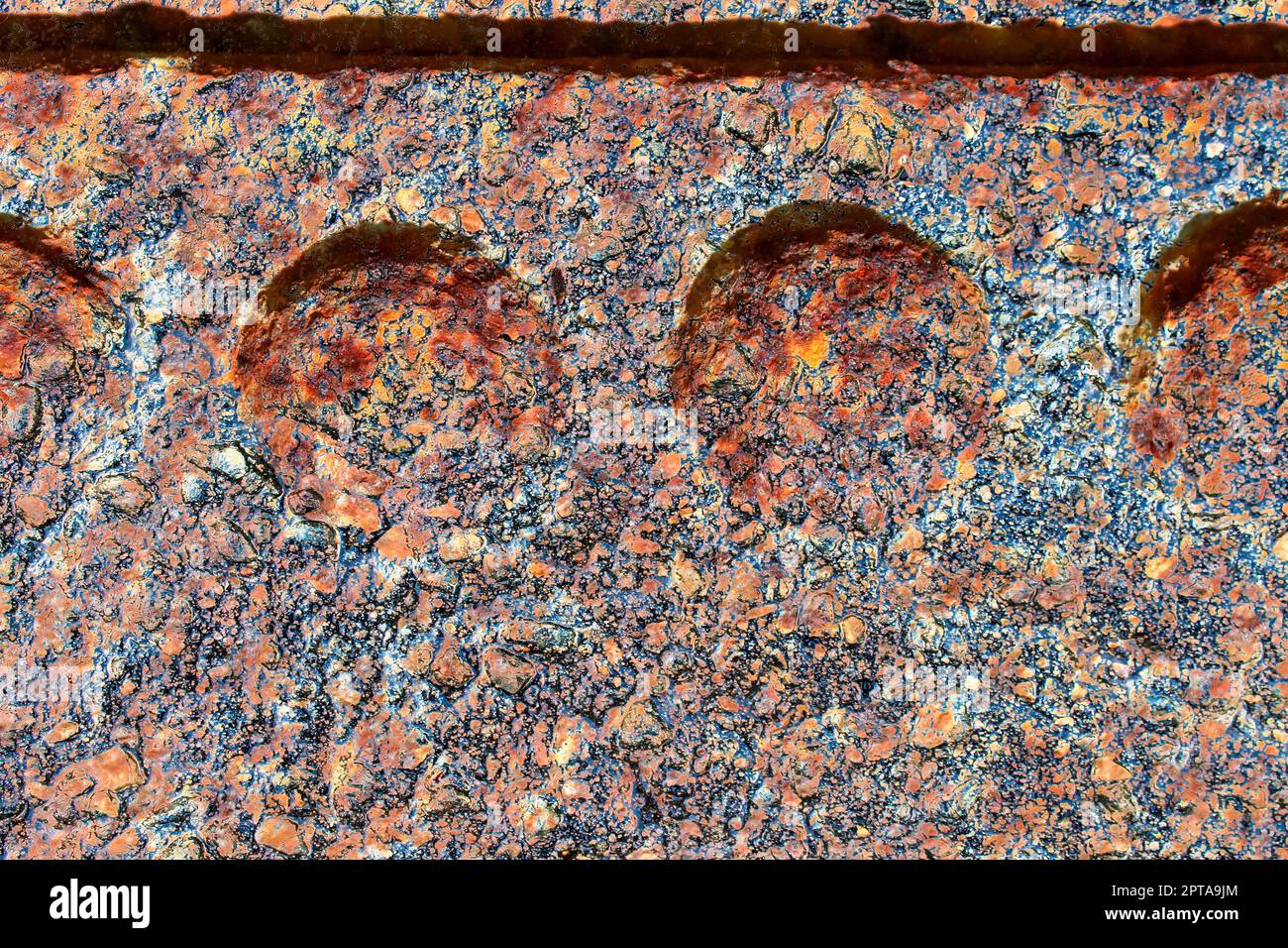 Detailed close up surface of rusty metal and stone with lots of ...