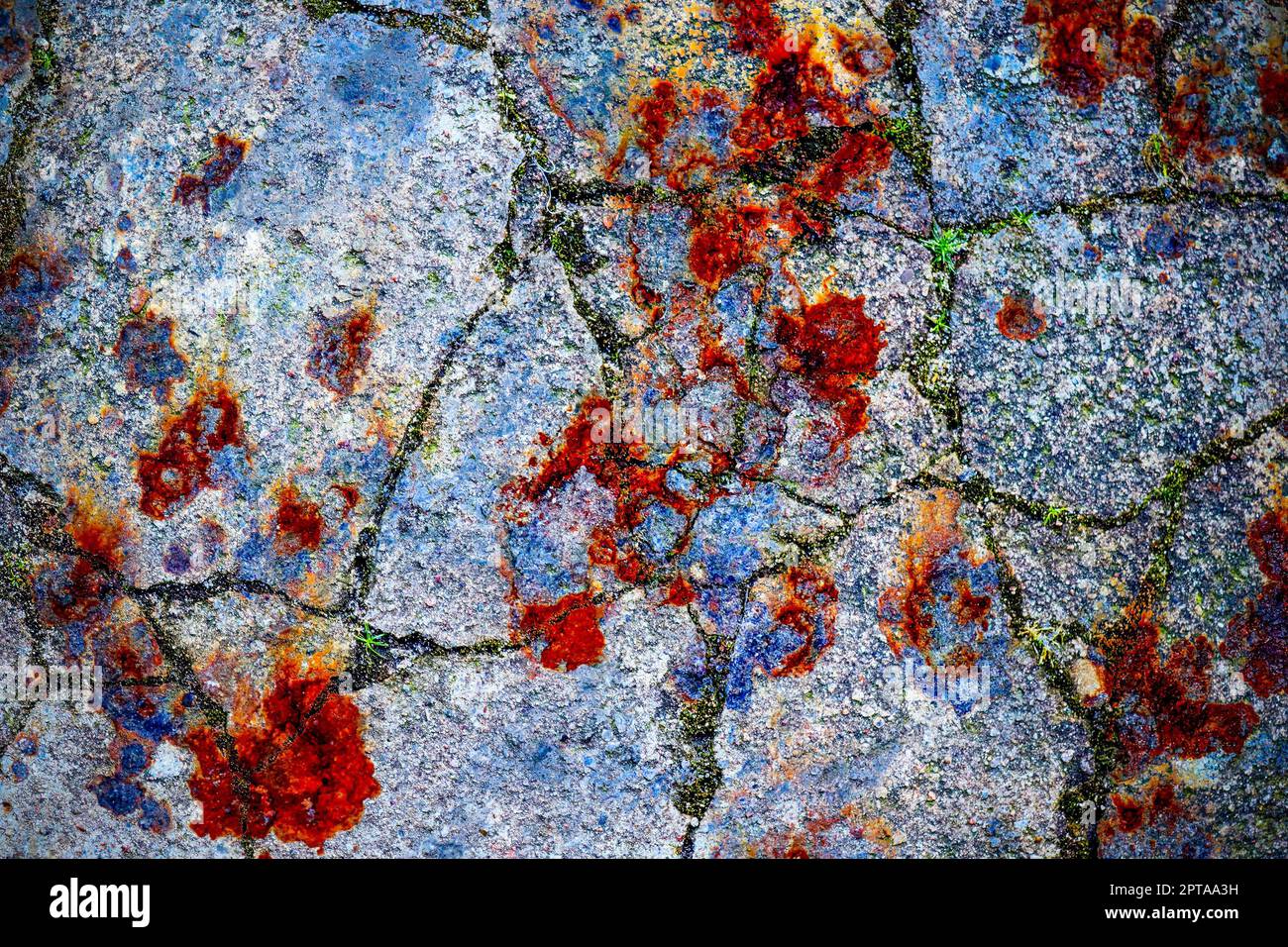 Detailed close up surface of rusty metal and stone with lots of ...
