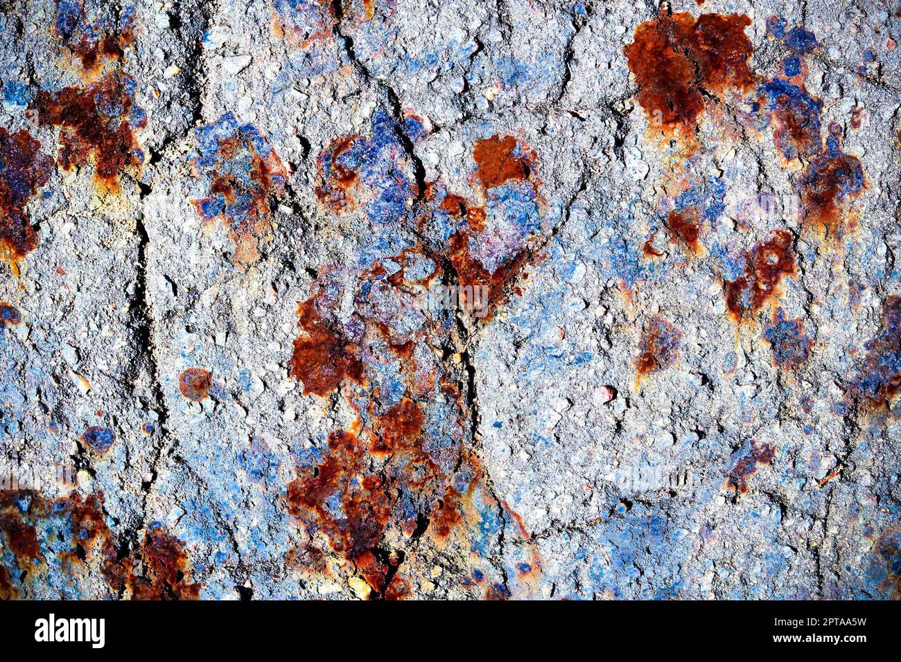 Detailed close up surface of rusty metal and stone with lots of ...