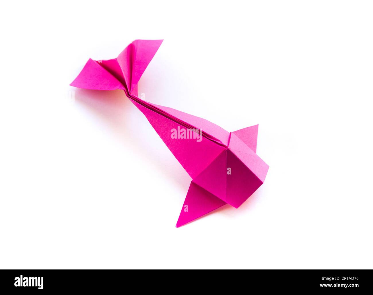 Pink paper fish origami isolated on a blank white background Stock ...