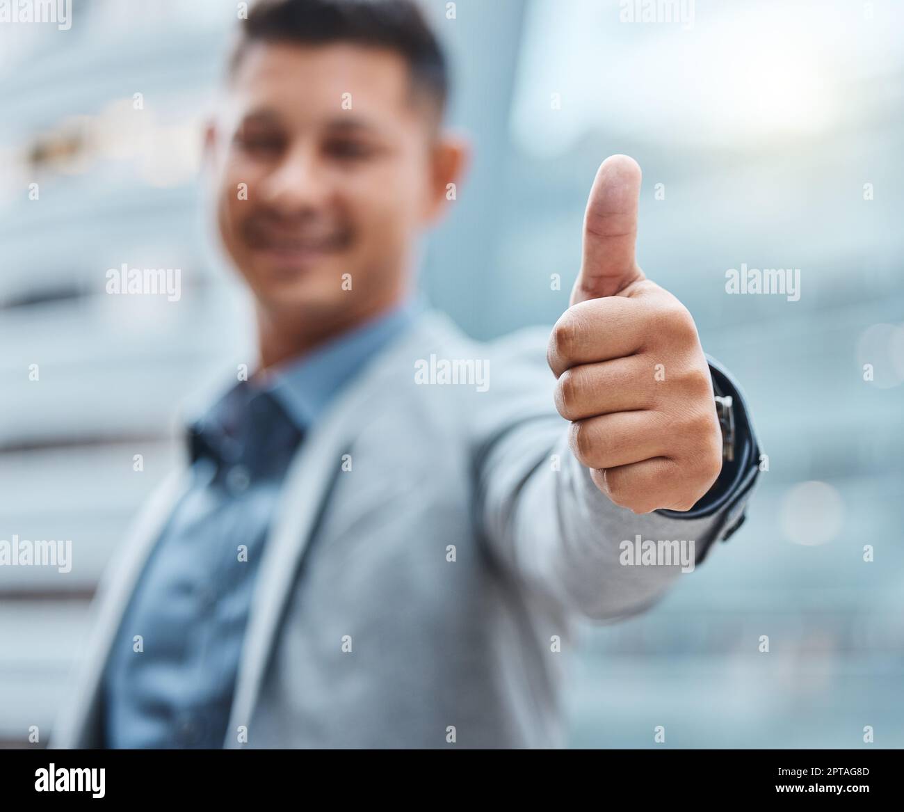 Keep it up and great things will happen. a young businessman showing ...