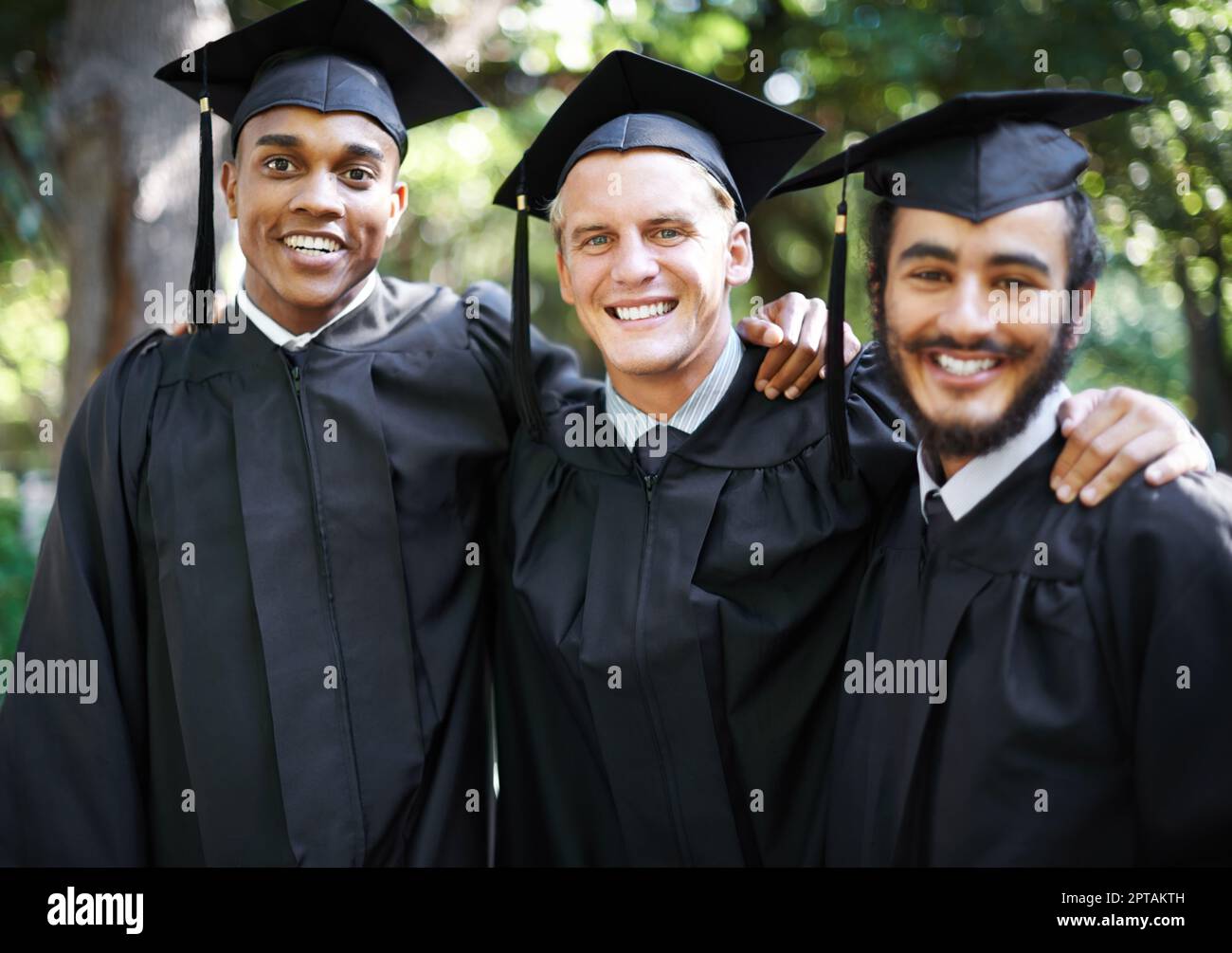 Were headed for success. Portrait of three happy male students on ...