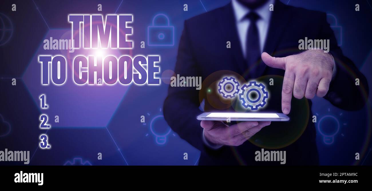 Sign displaying Time To ChooseJudging the merits of multiple options ...