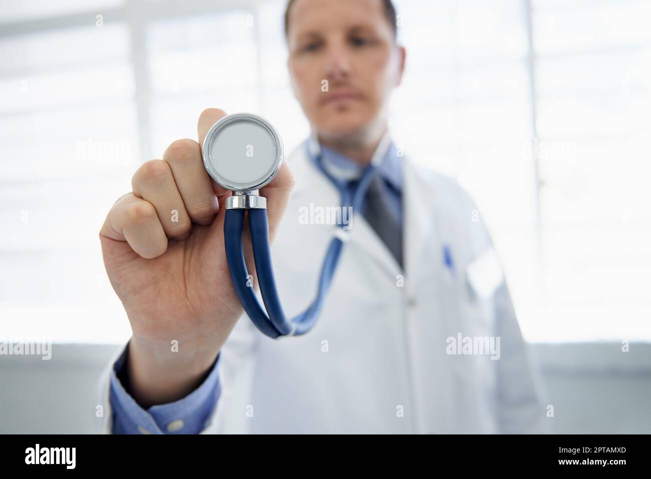 Hell take care of your medical needs. a male doctor Stock Photo - Alamy