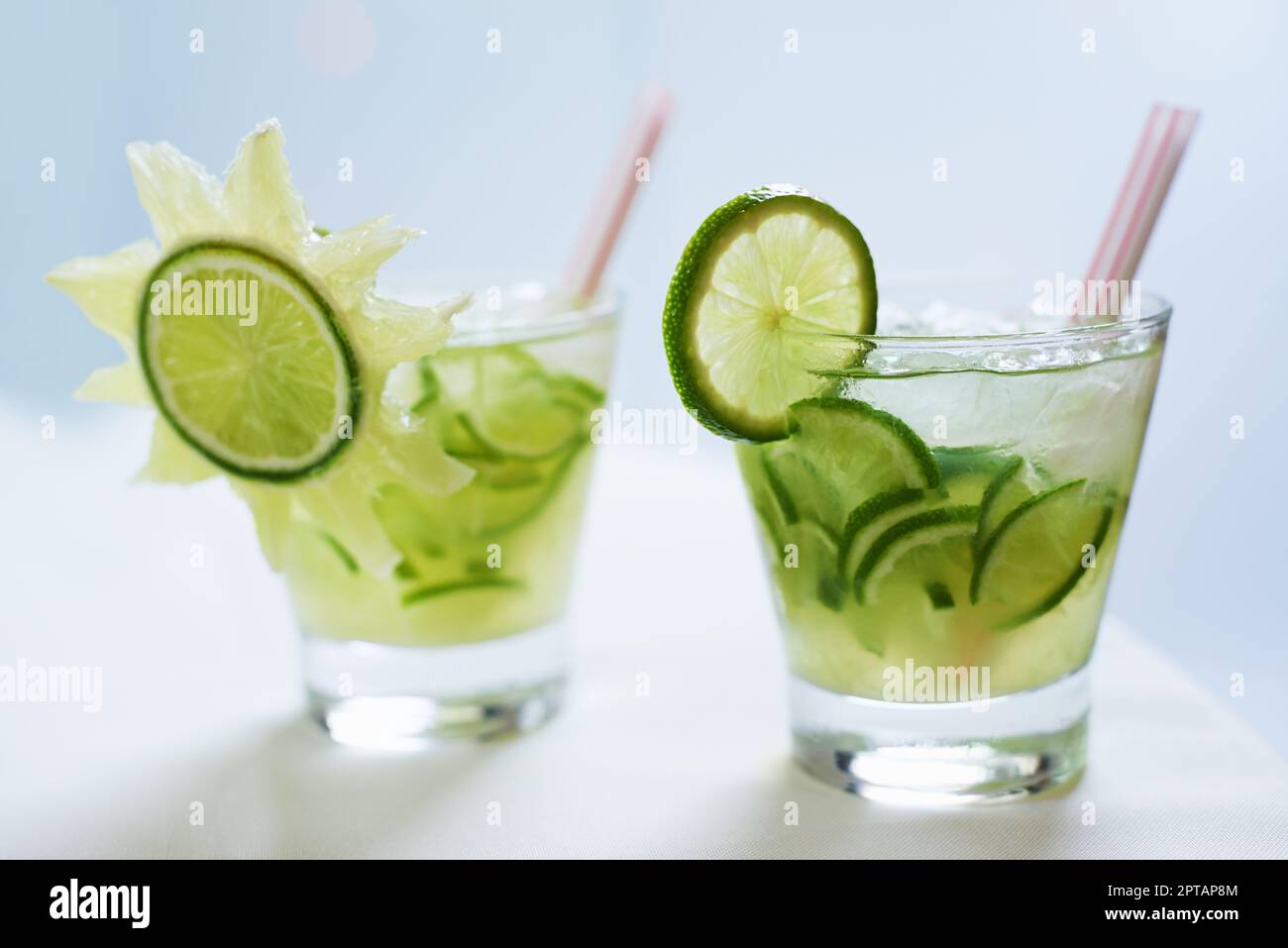 The perfect summer refresher. Two beverages in glasses decorated with ...