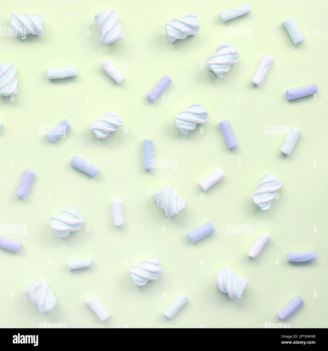 Colorful marshmallow laid out on lime paper background. pastel creative ...