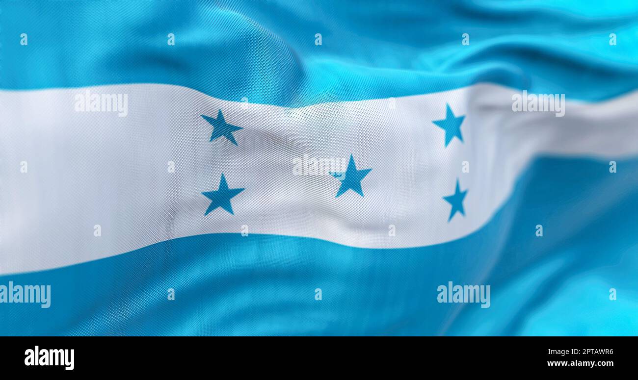 Close-up view of the Honduras national flag waving in the wind. The ...