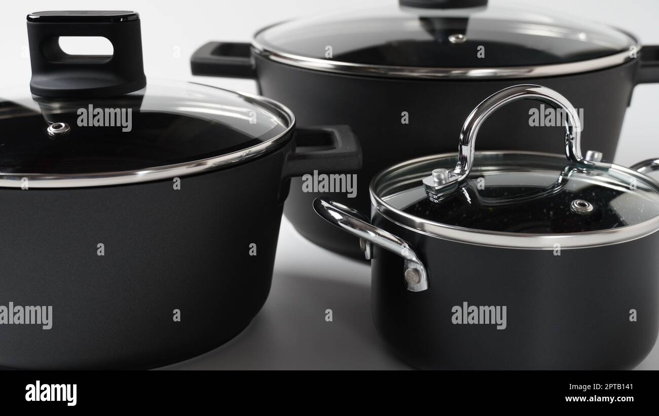Black cooking pots hi-res stock photography and images - Alamy