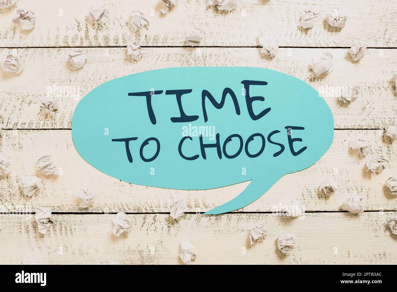 Sign displaying Time To ChooseJudging the merits of multiple options ...
