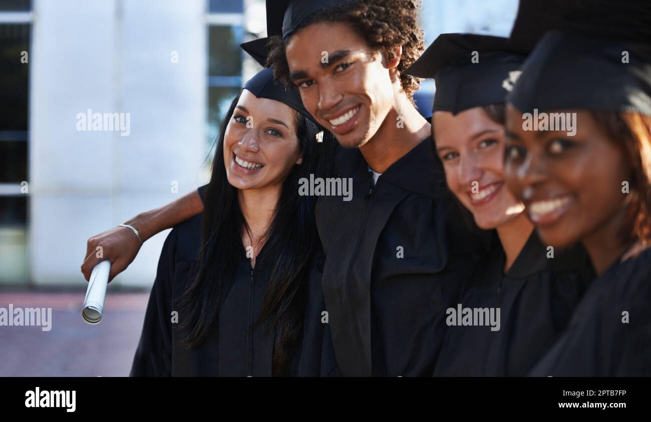 Weve officially graduated. A group of smiling college graduates ...
