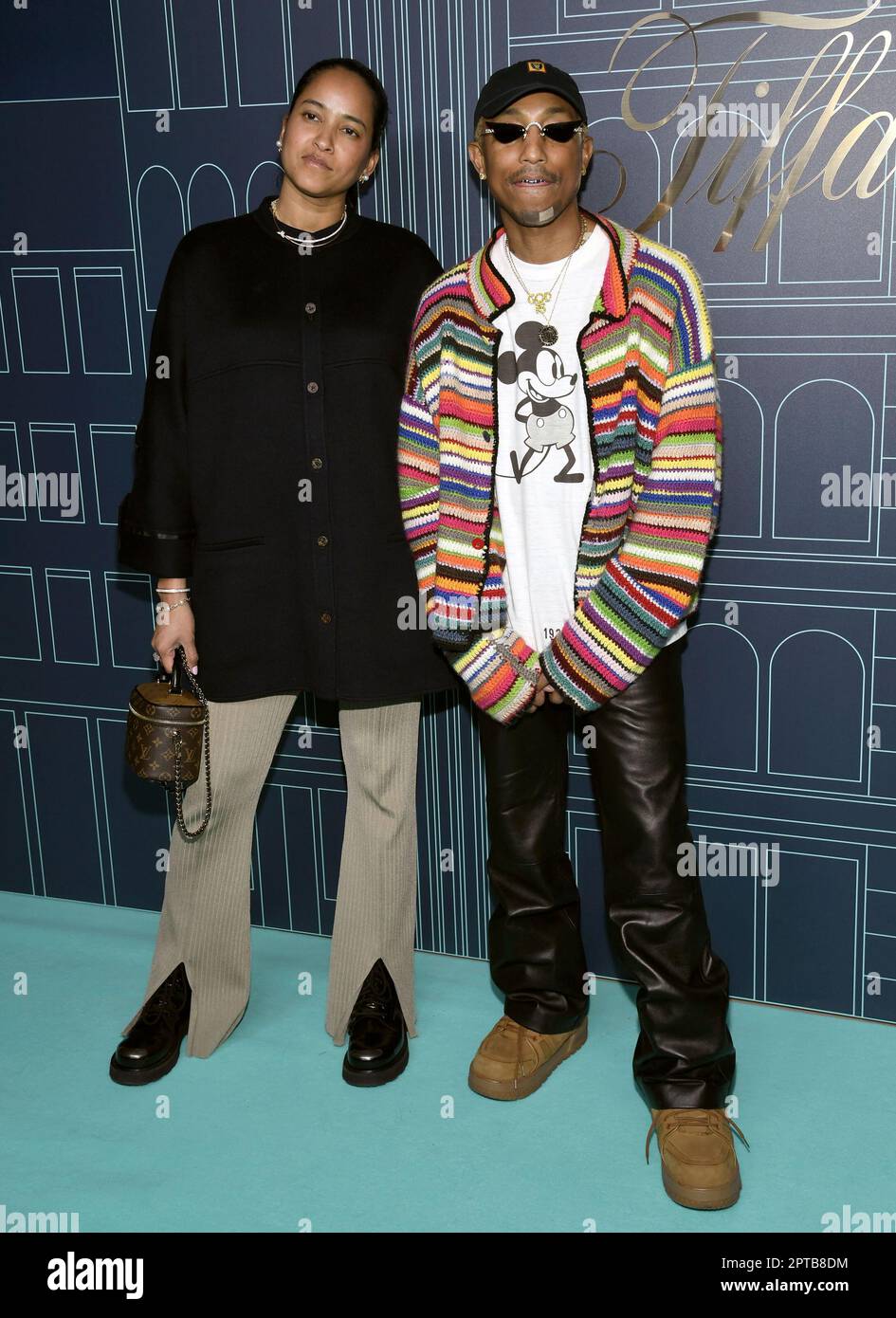 Helen Lasichanh, left, and Pharrell Williams attend the Tiffany & Co ...