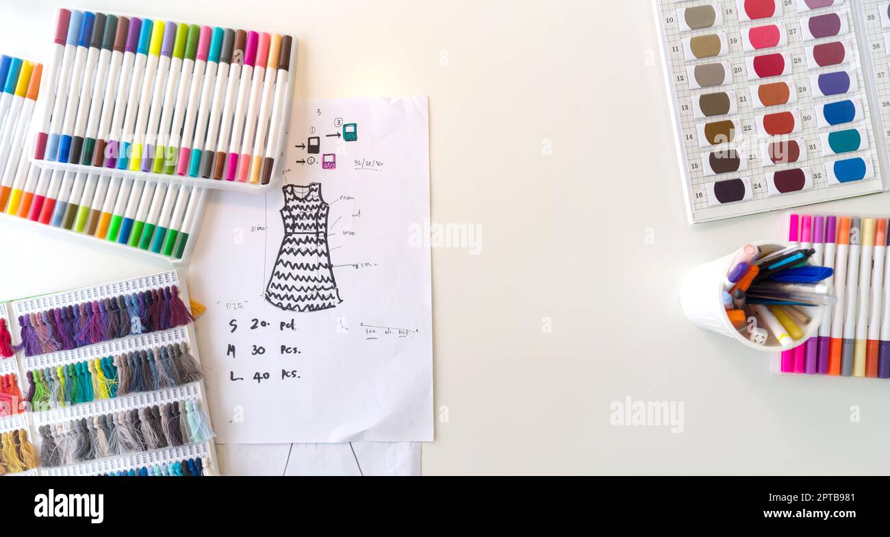 Fashion designer room. Pattern for cloth, silk thread color sample ...
