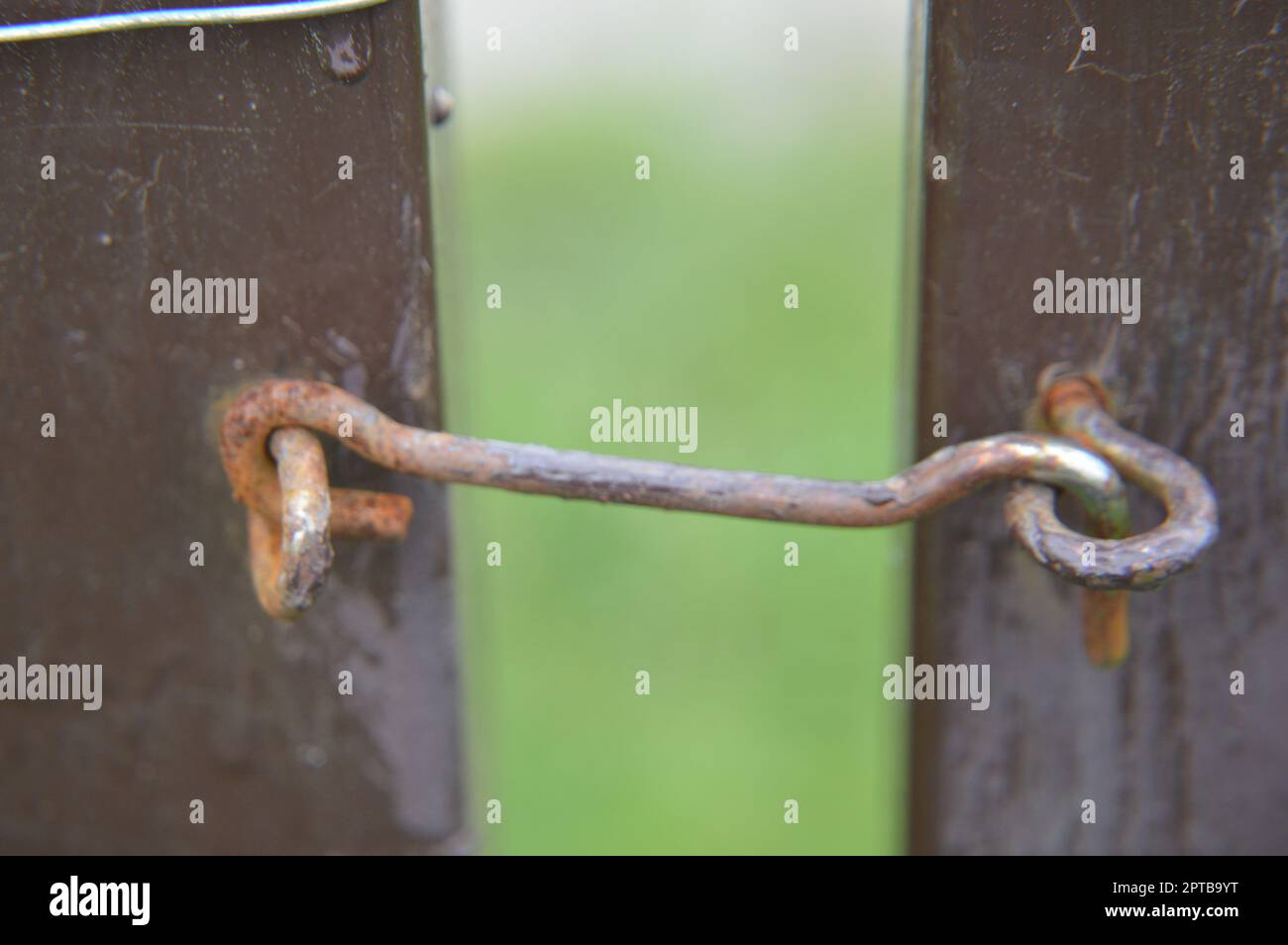 Installing fasteners for installing a he padlock Stock Photo - Alamy