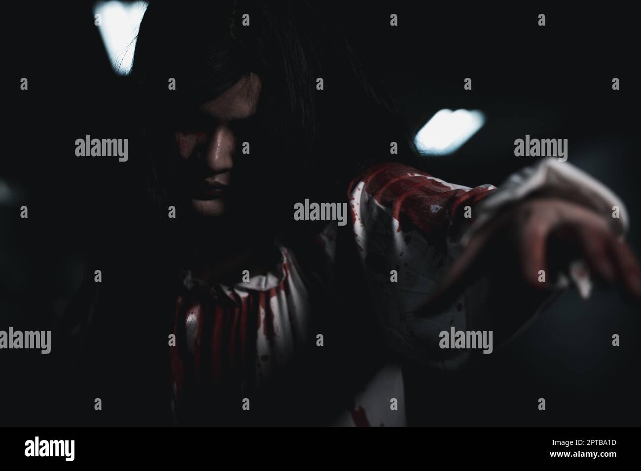 Bloody halloween makeup. Horror bloodthirsty ghost girl hair covering ...