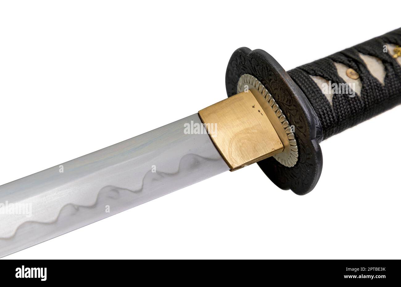 The Habaki - collar is made of polished brass. It is at the base of a ...