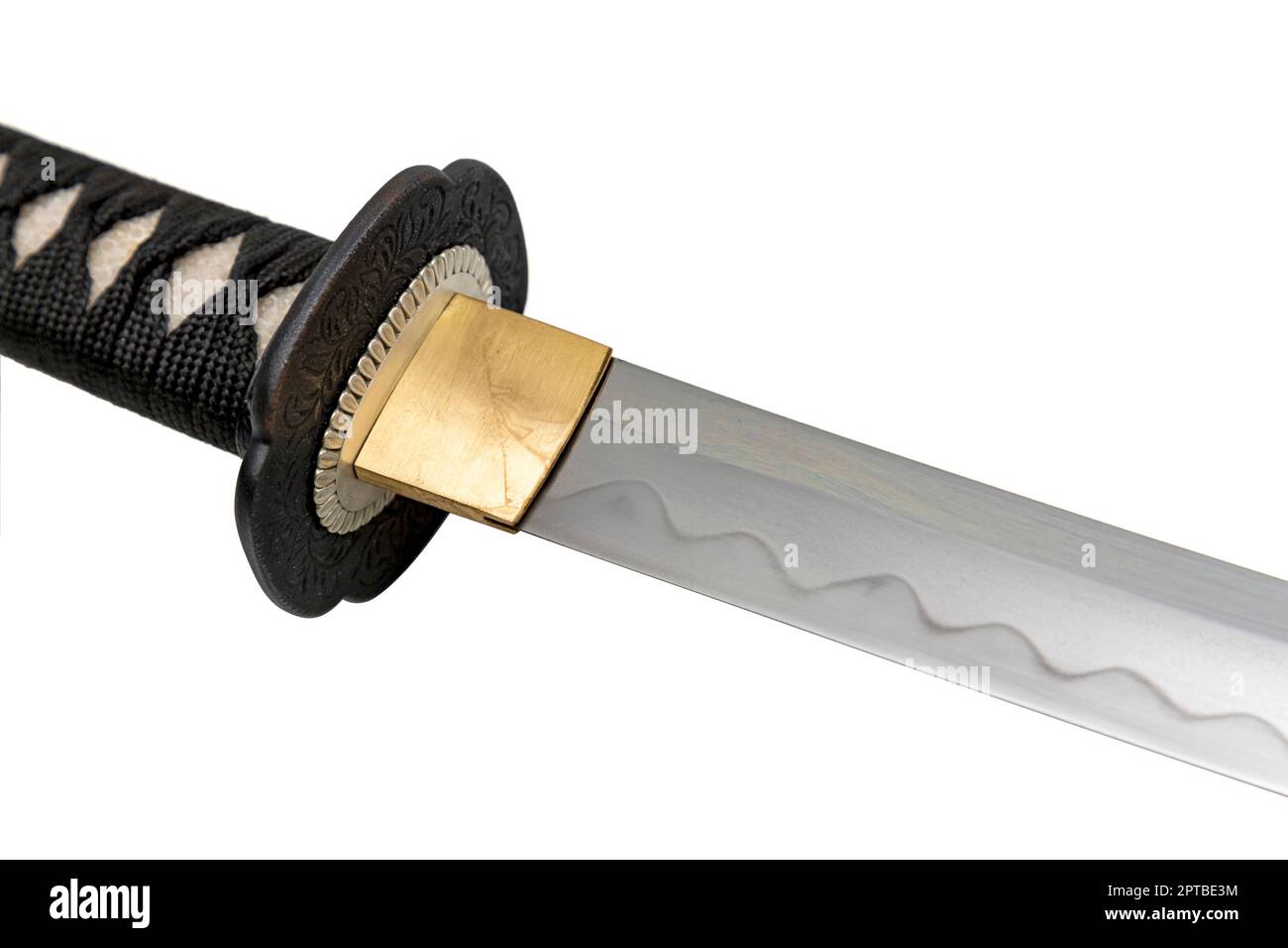 The Habaki - collar is made of polished brass. It is at the base of a ...