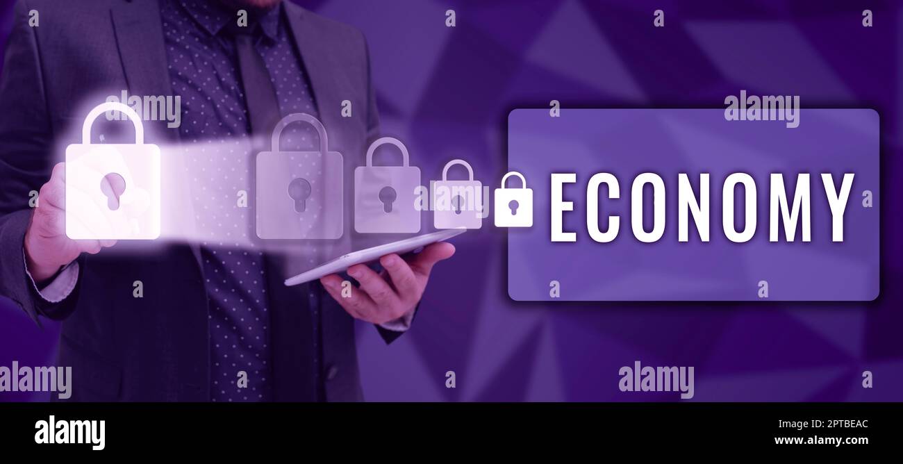 Hand writing sign Economy, Concept meaning the system of how money is ...