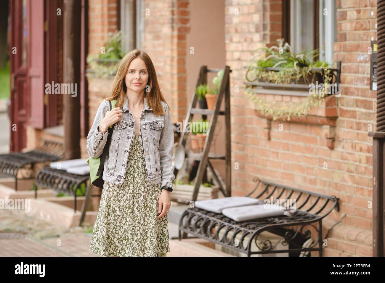 Cute tourist discovering streets of old town Stock Photo - Alamy
