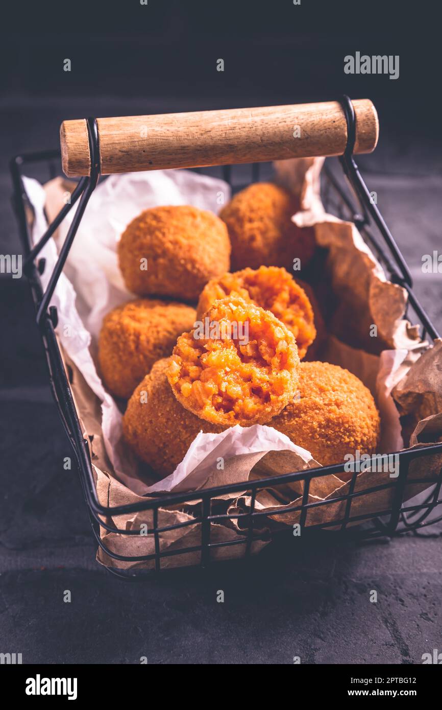 Homemade Arancini - deep fried rice balls stuffed with Mozzarella ...
