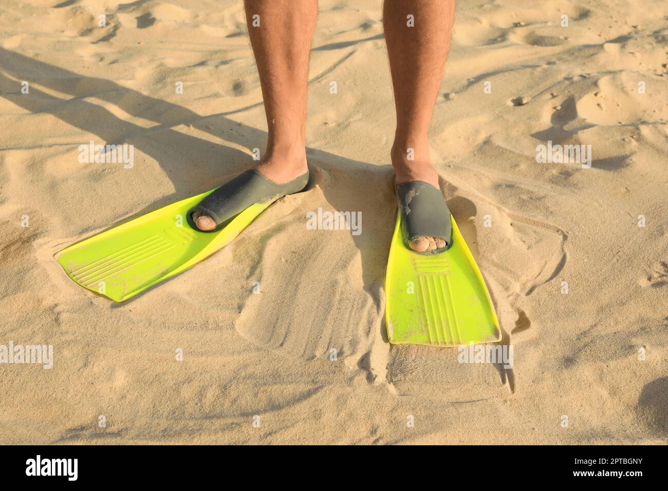 Man wearing swimming flippers hi-res stock photography and images - Alamy