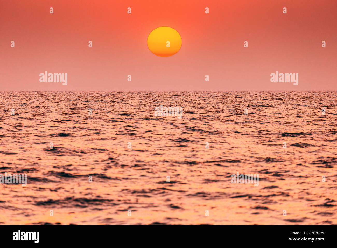 Natural Color Sunset Sunrise Sky Over Sea. Seascape With Shining ...