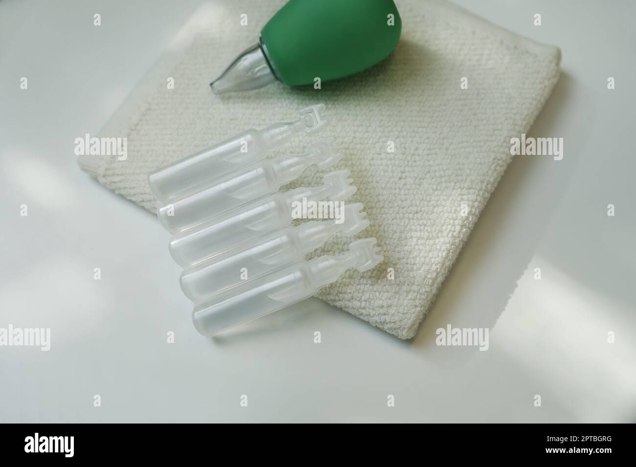 Single dose ampoules of sterile isotonic sea water solution, towel and ...