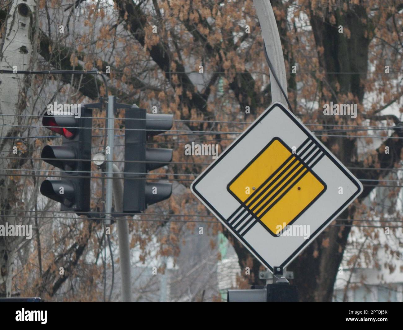 Road signs indicating the direction of movement of cars and pedestrians ...
