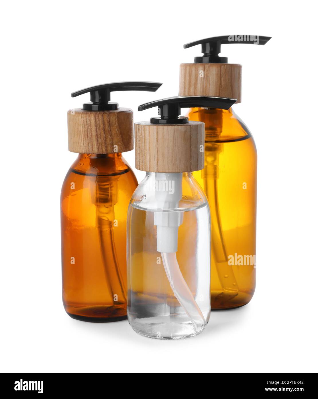 Bottles with dispenser caps on white background Stock Photo - Alamy