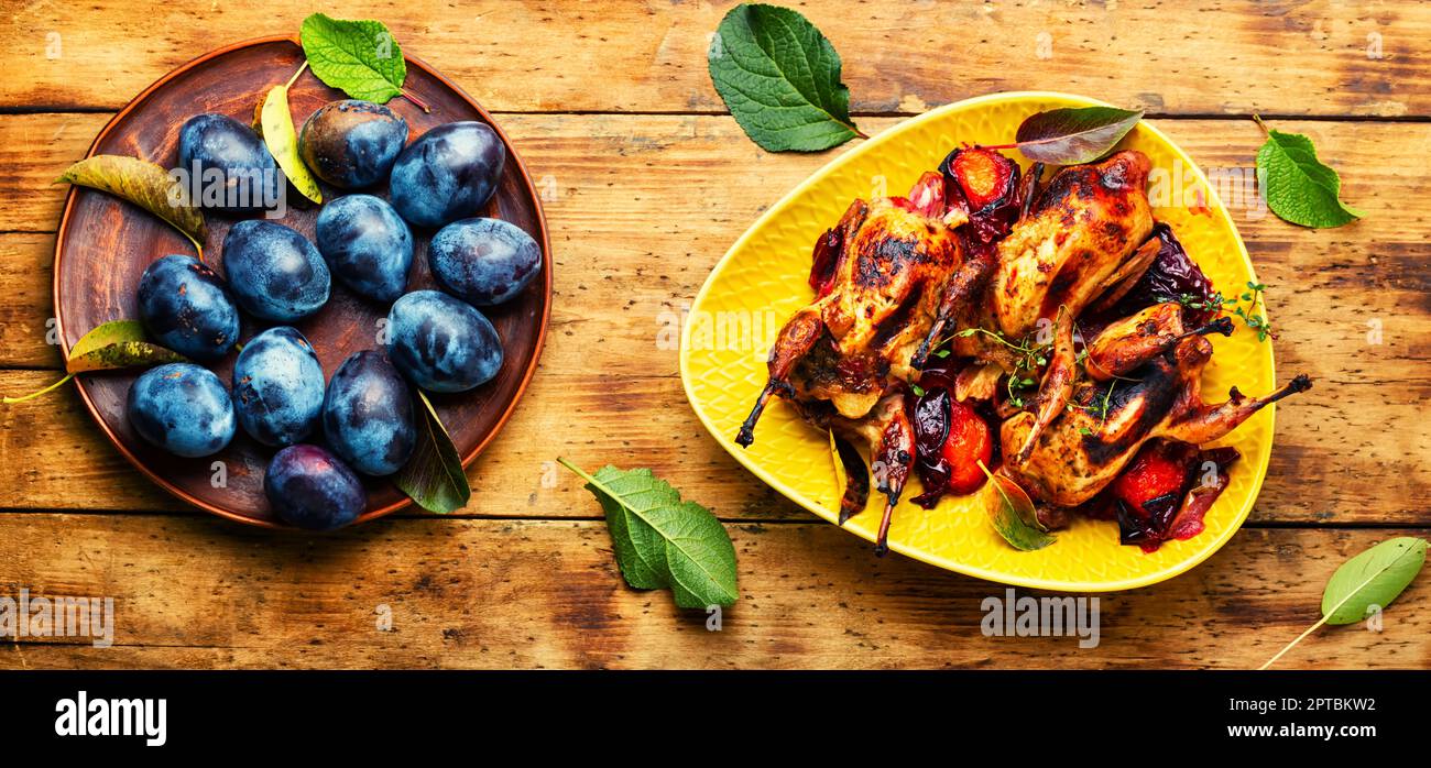 Roasted whole quail in plum sauce. Meat with plum Stock Photo - Alamy