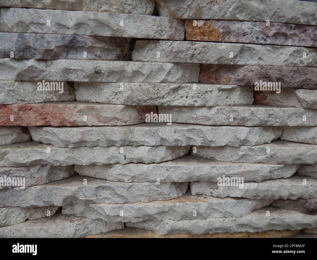 Texture of a wall of a building from a stone laying Stock Photo - Alamy
