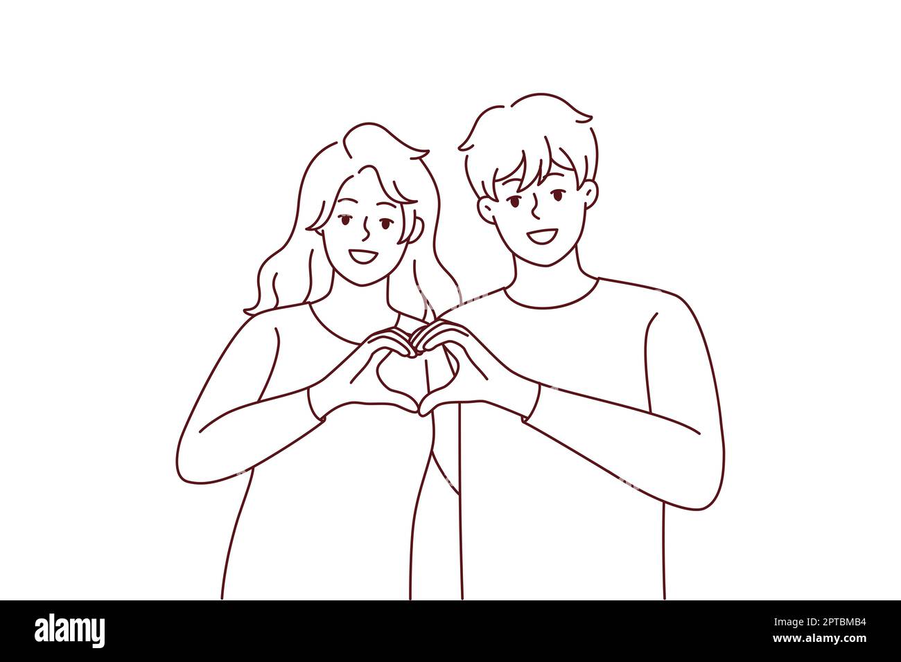 Smiling couple hug show heart hand gesture. Happy man and woman ...